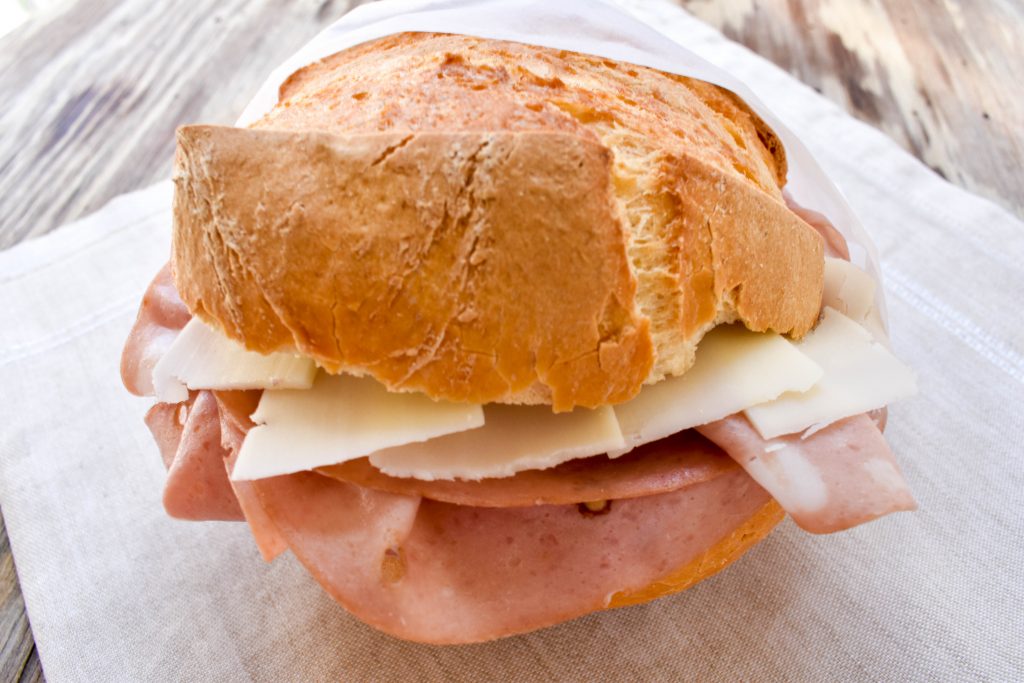 Panini with mortadella and provolone cheese - Italian Spoon